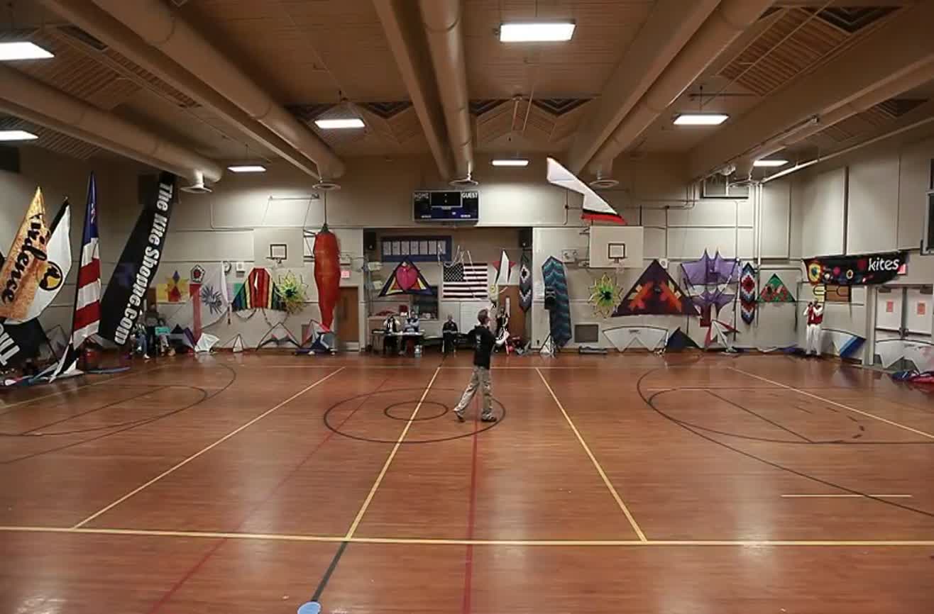 A first place winner at an indoor kite competition.