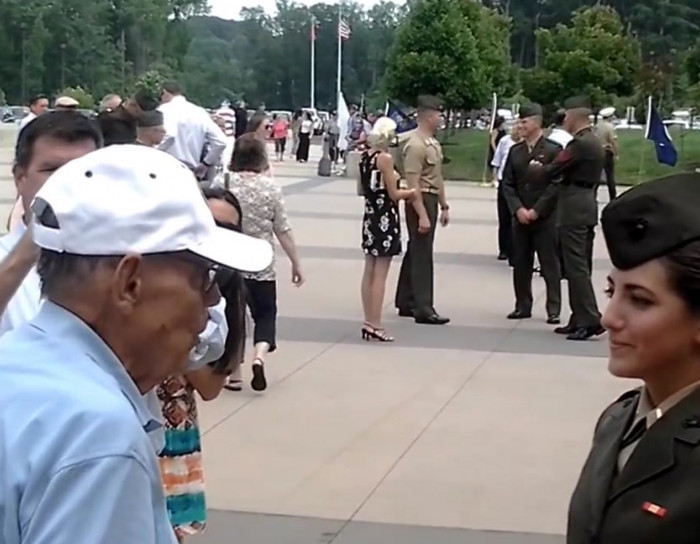 Grandfather to granddaughter first salute.