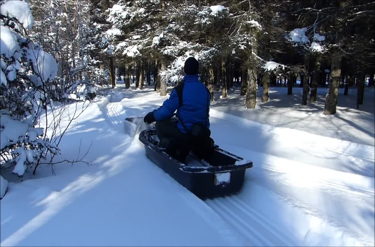 Amazing battery-powered track, which can be used as an all-terrain vehicle.