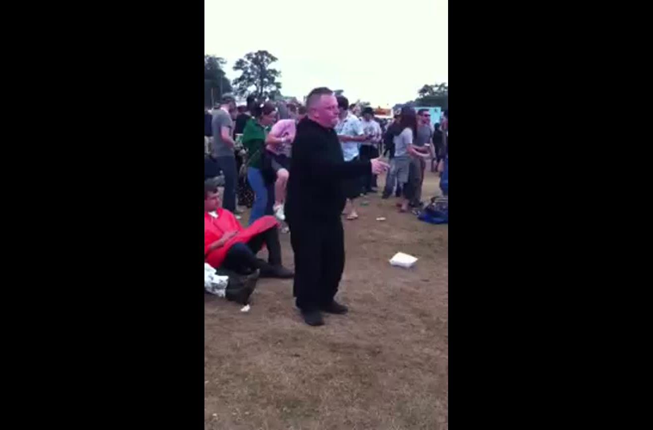 Man dances at rave.