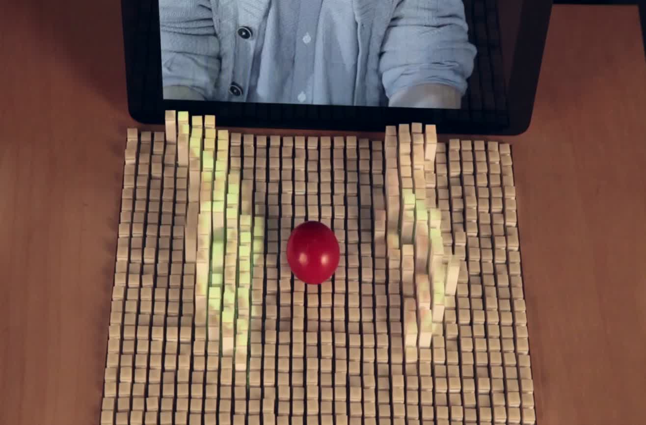 Interacting with a dynamic shape display.