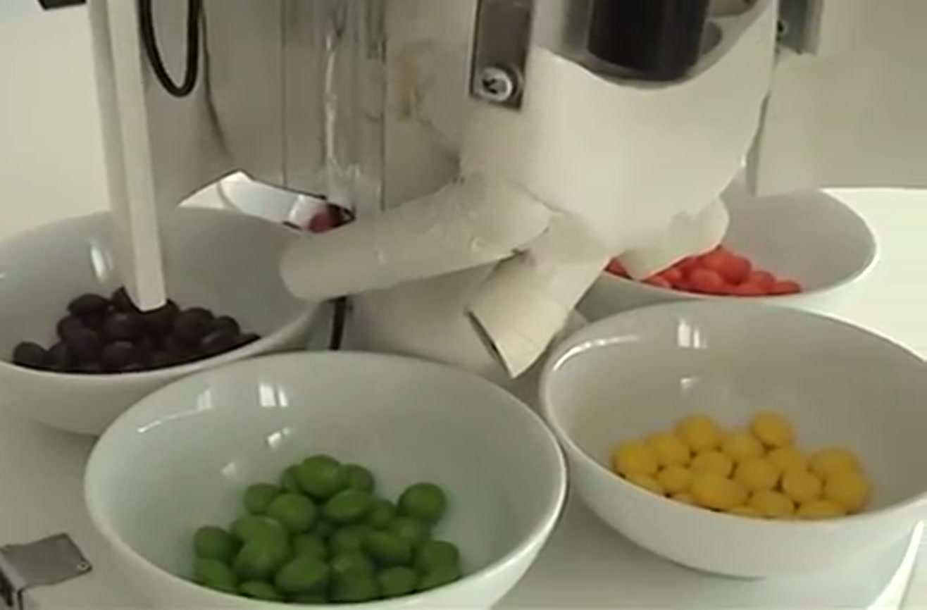 Here's a candy sorting machine that separates your favorite colors for you.