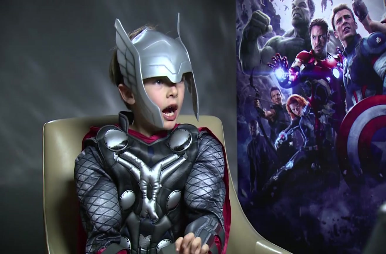 A little boy dressed as "Mini Thor" conducts a fantastic interview with ...