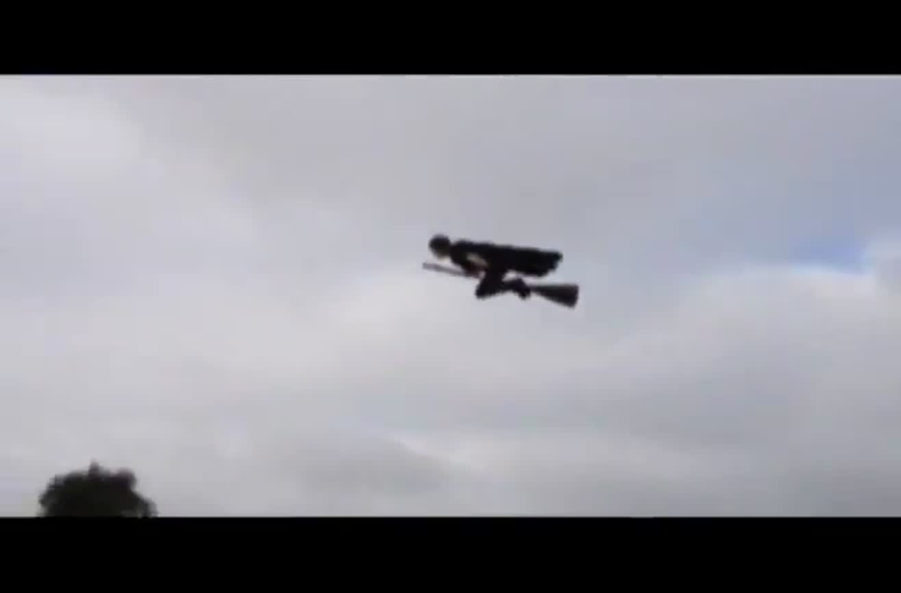 Man makes an RC plane that looks like a person flying on a broomstick.