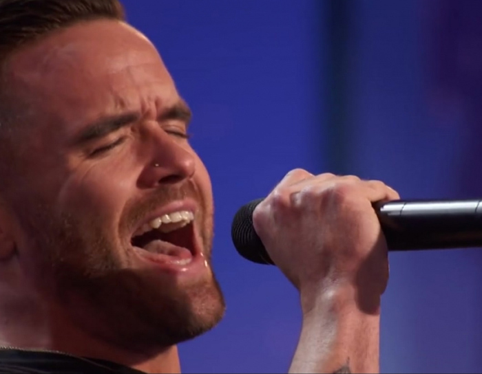 Queen cover earns singer a standing ovation.