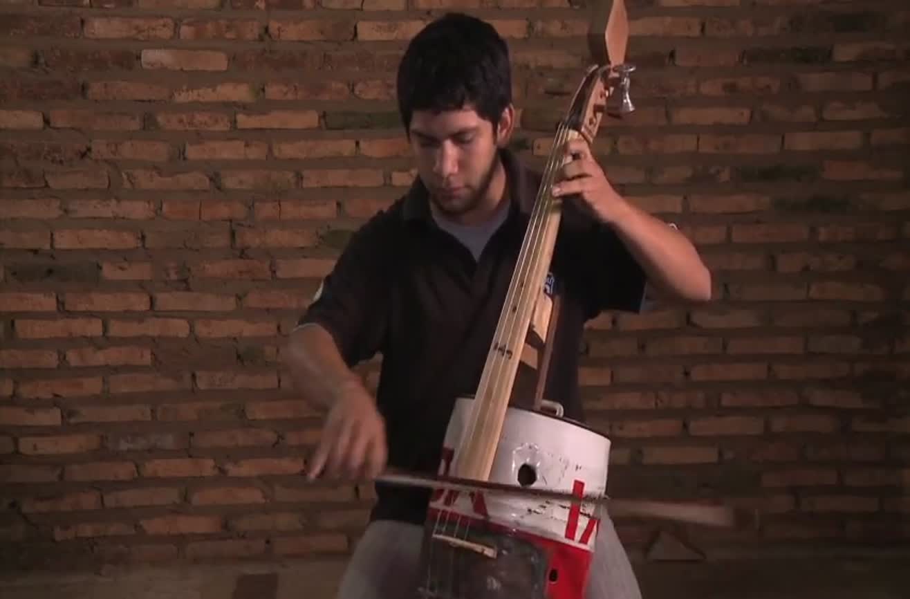An orchestra that performs on instruments made from trash.