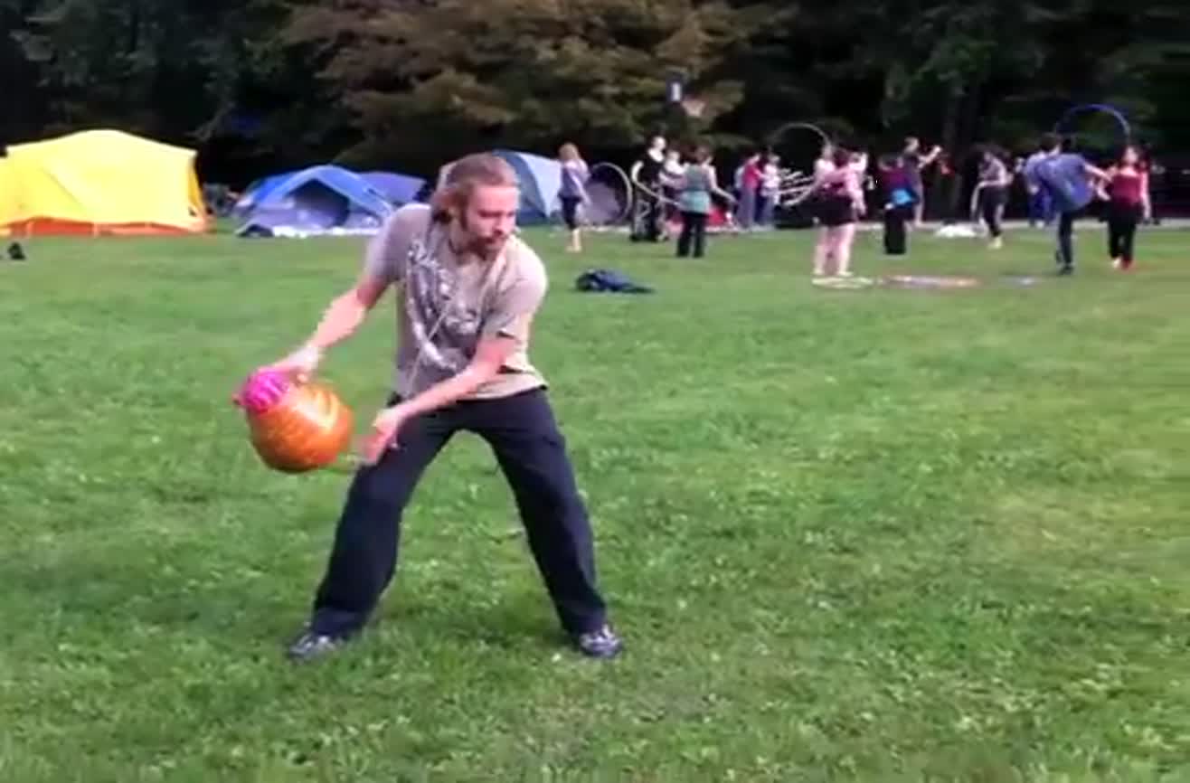 Giant wooden spinning top.