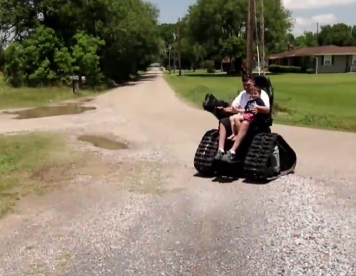 Combat veteran invents all-terrain "tank chair" for his paralyzed wife.