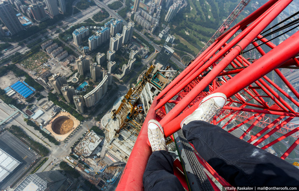 Two guys climb the world's second tallest building with no safety equipment.