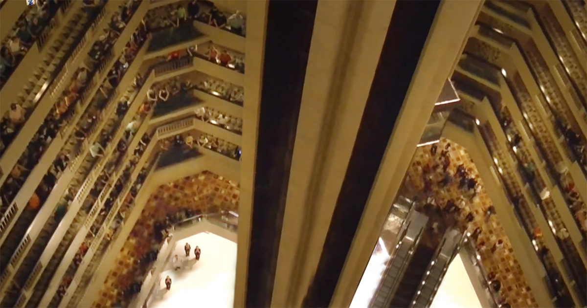 Kentucky All State Choir sings the National Anthem in an 18-story hotel.