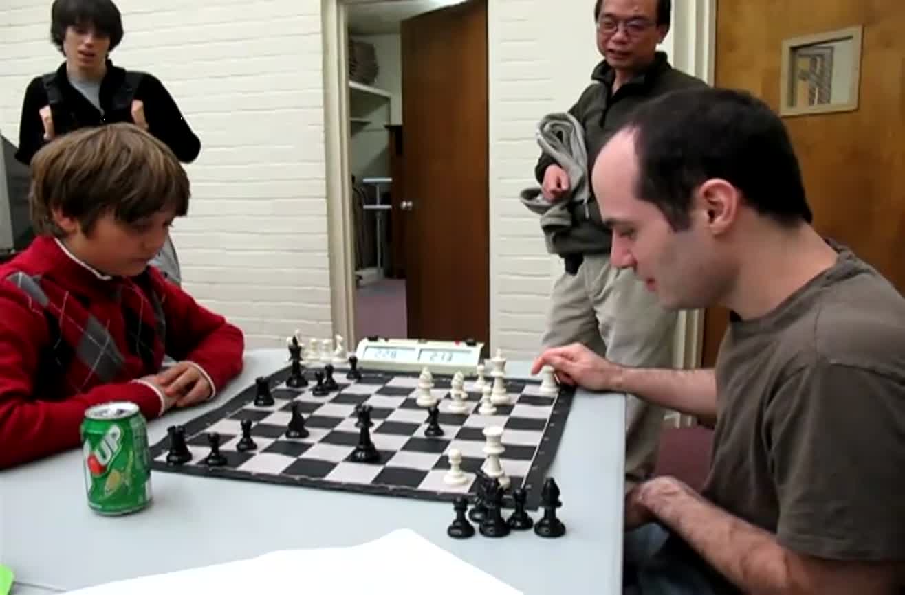 10-year-old boy beats an international chess master in a blitz game.