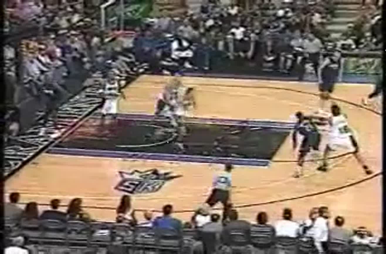 Probably the best "behind the head no look" pass ever in basketball.