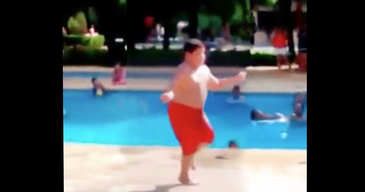 Kid at pool party does a truly awesome dance routine to "Cuban Pete".