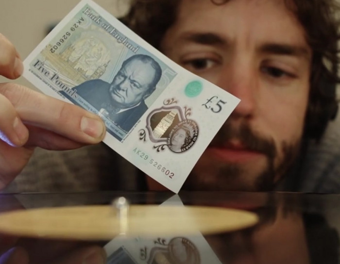 The UK's new plastic bank note can play records.