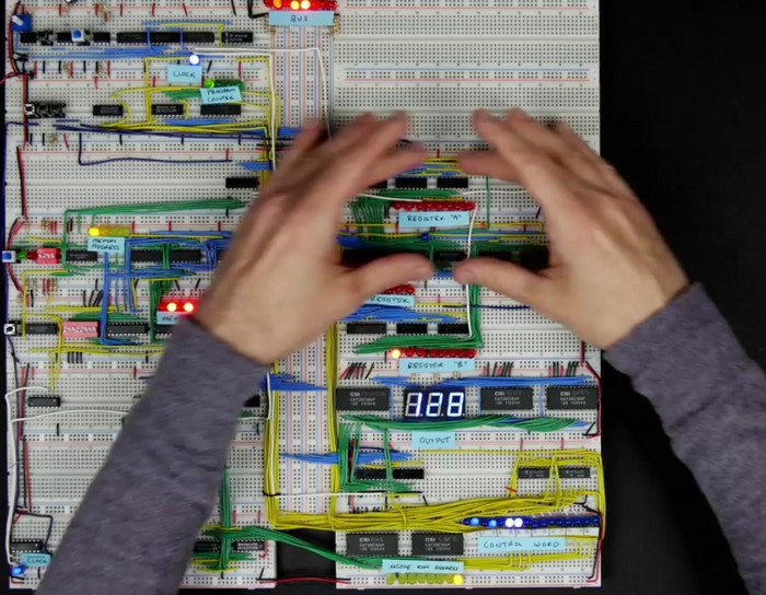 Guy builds a computer step-by-step and explains how every part works.
