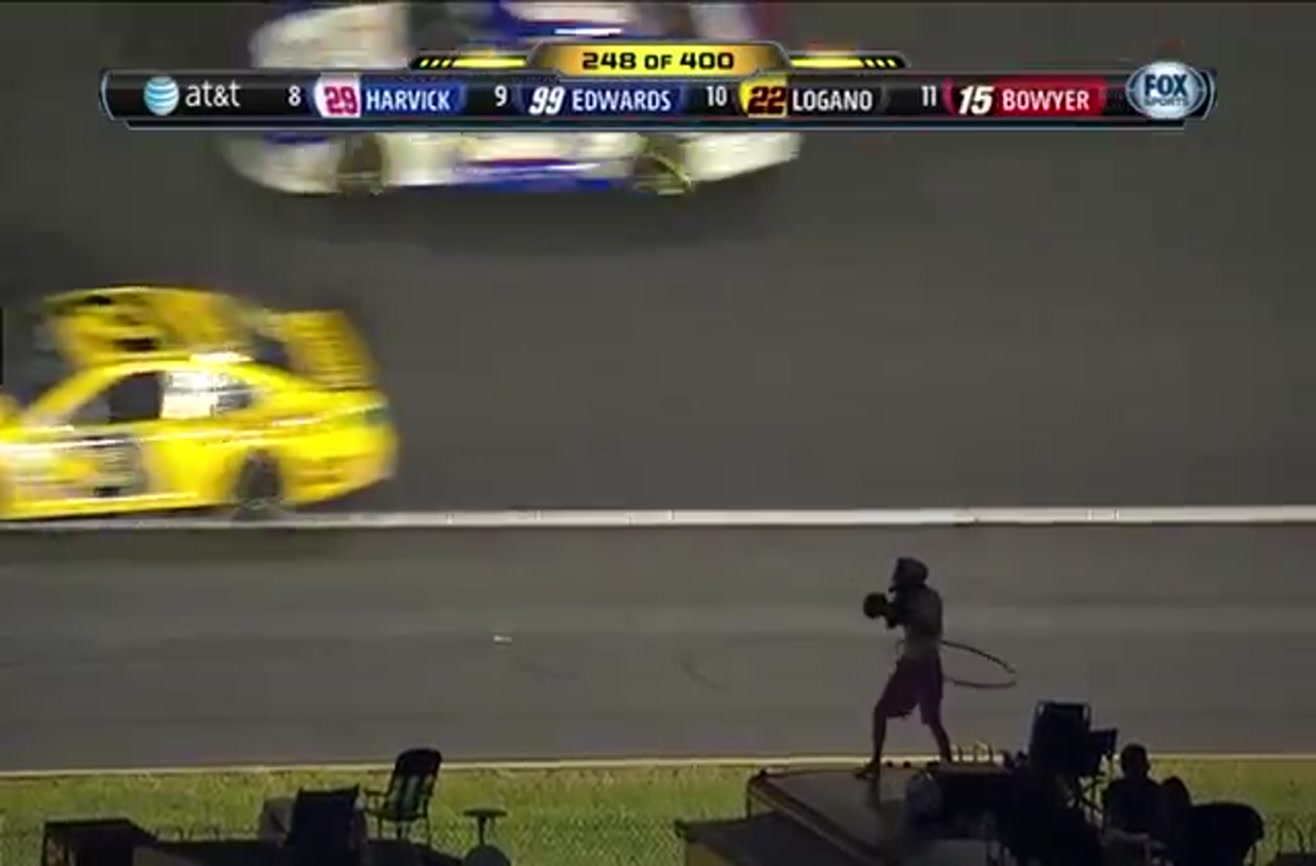 NASCAR fan's race-time antics leave the announcers speechless.