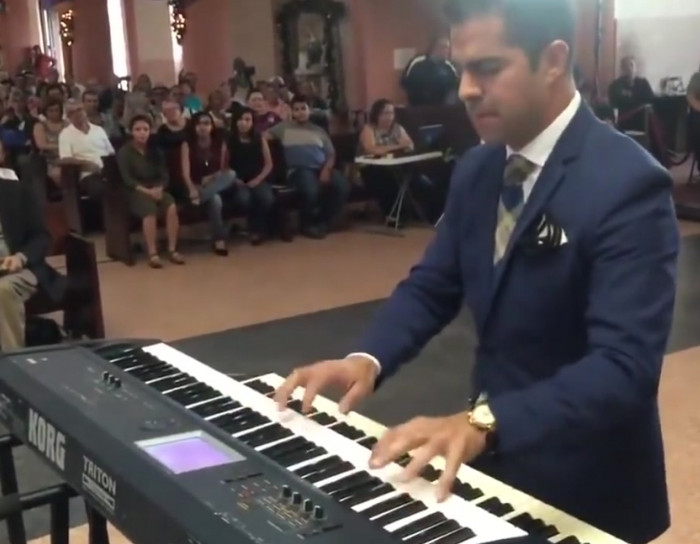 Bride is late, so the groom starts playing classic movie themes on the ...
