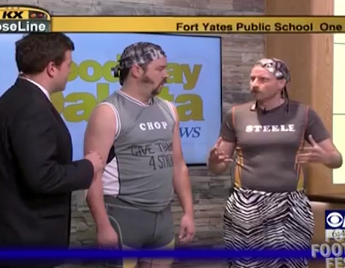 Fake "strongmen" prank a local news show.