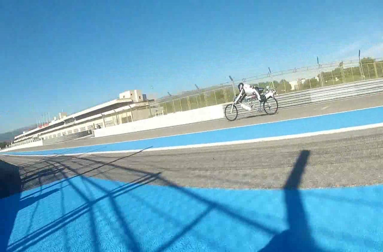 Francois Gissy sets a world record with a rocket-powered bicycle.