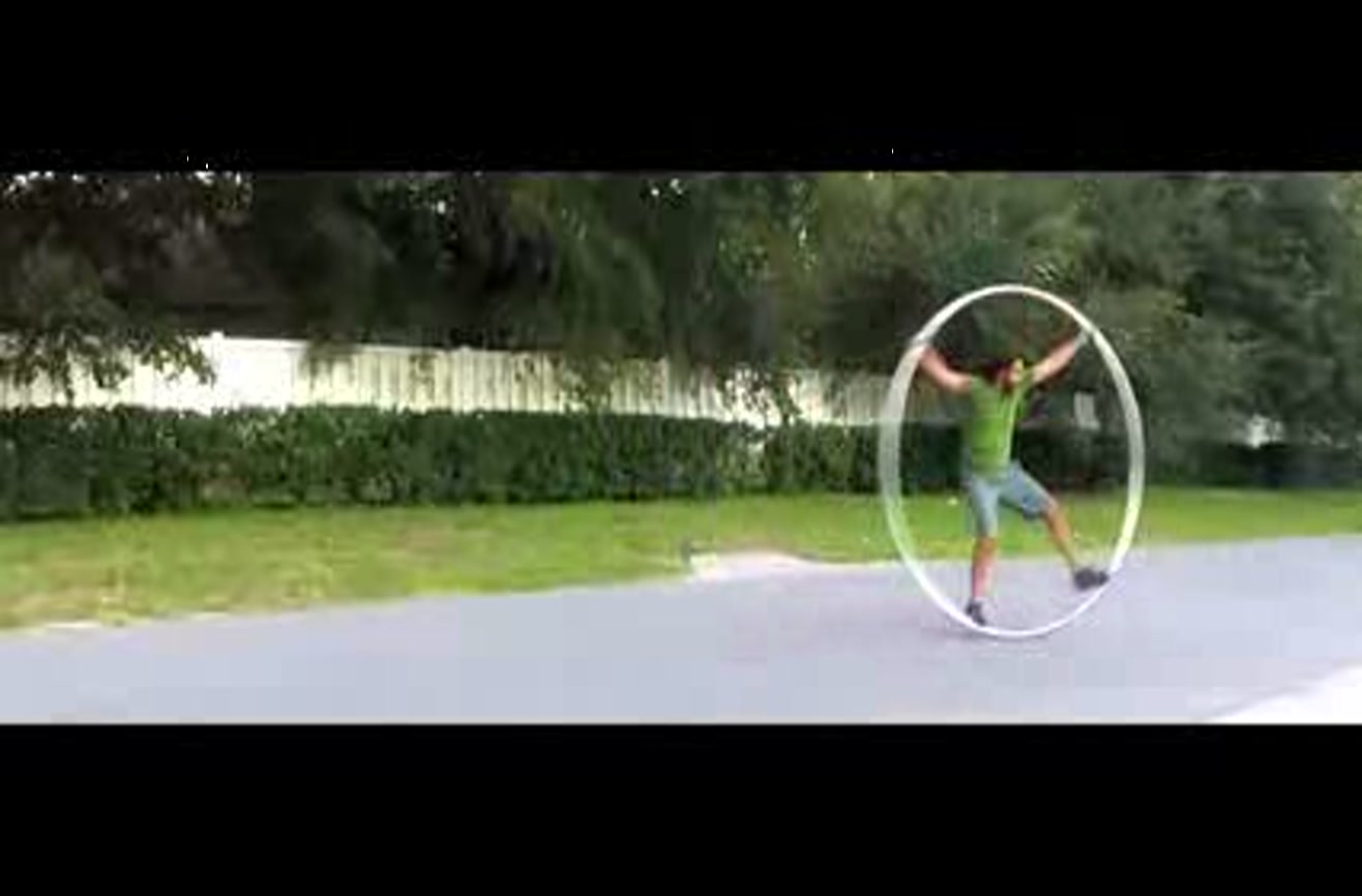 Man spends 30 days learning how to spin in a big wheel.
