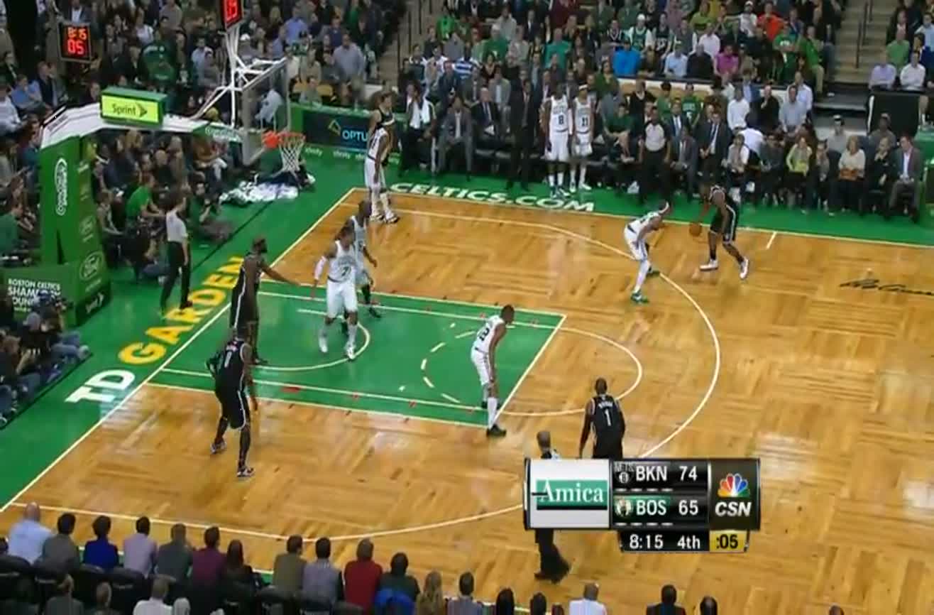 Joe Johnson trips up Paul Pierce with his handles.