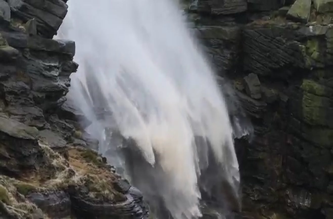 Waterfall gets blown upwards by powerful winds in England.