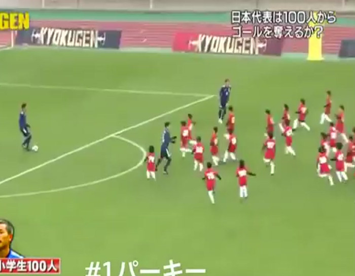 Japan: Three pro soccer players vs. 100 kids.