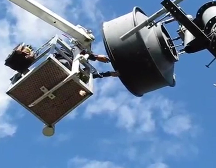 Squirrel fills antenna with acorns.