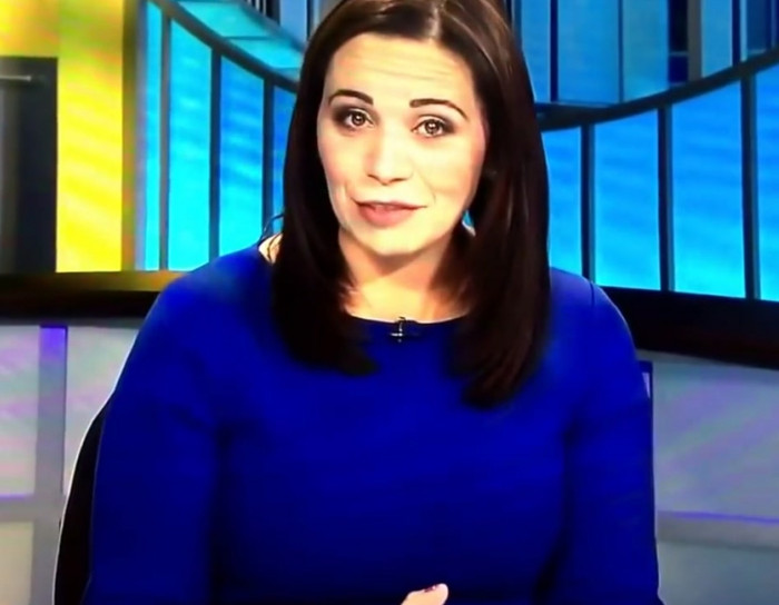 Reporter can't stop laughing during live broadcast.