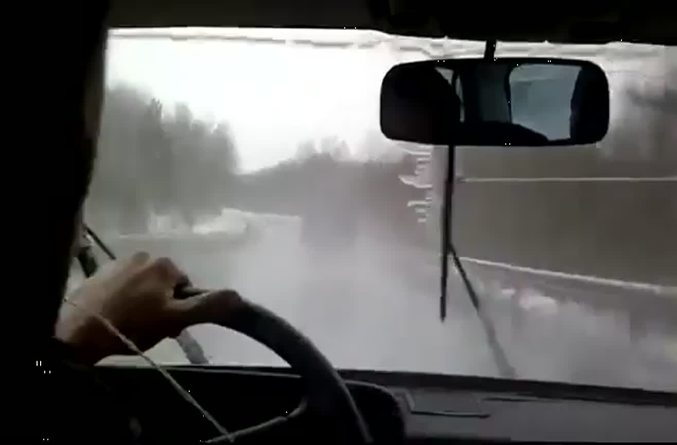A Russian man's unique solution for broken windshield wipers.