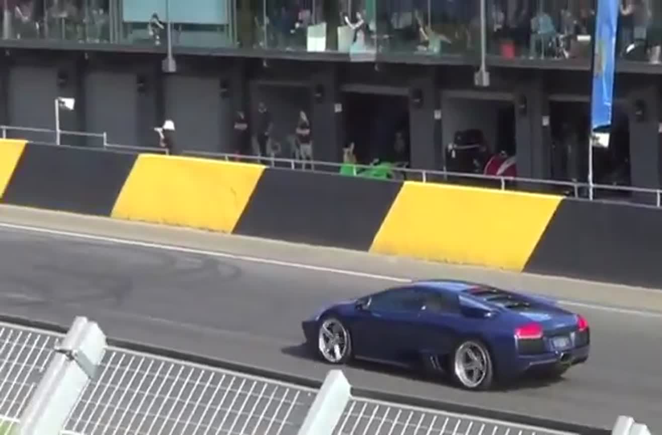 Man jumps over a Lamborghini Murcielago.