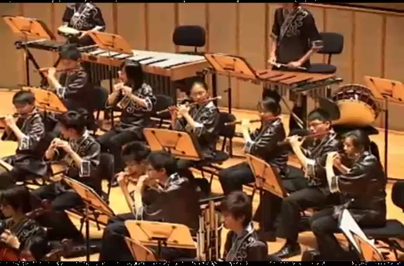 Orchestra plays Mario theme.