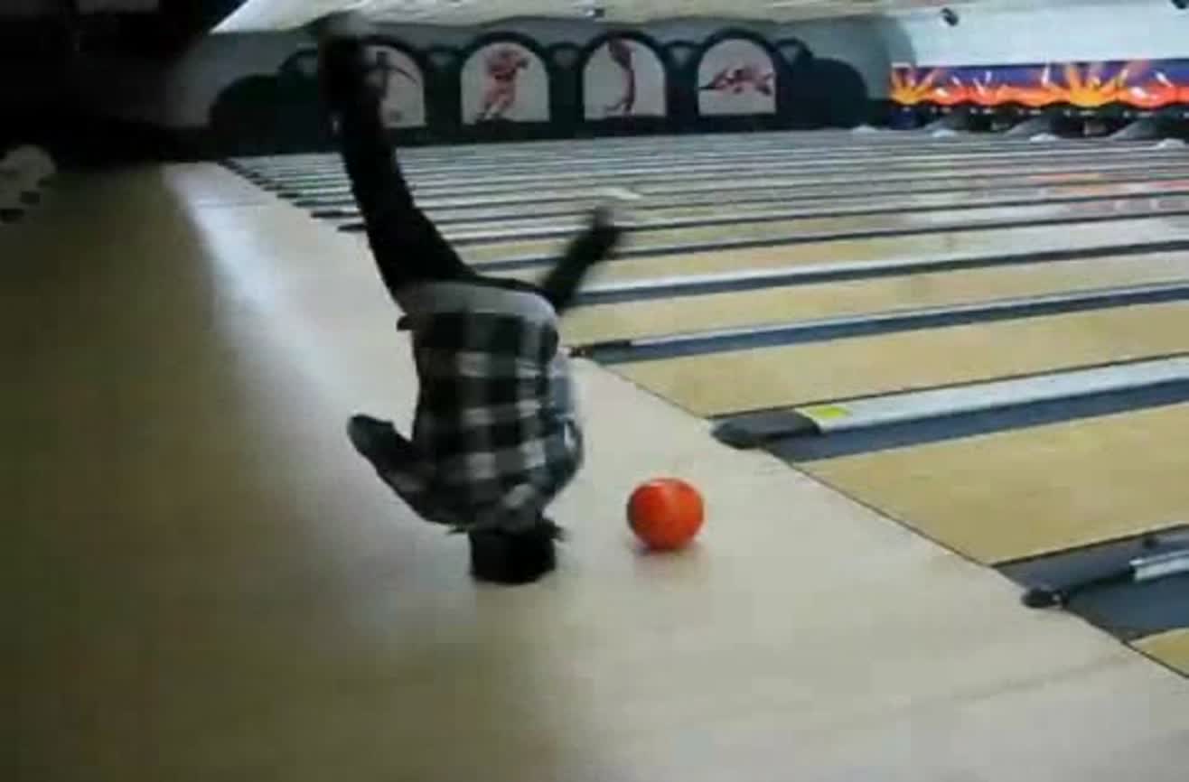 Amazing headspin bowling strike.