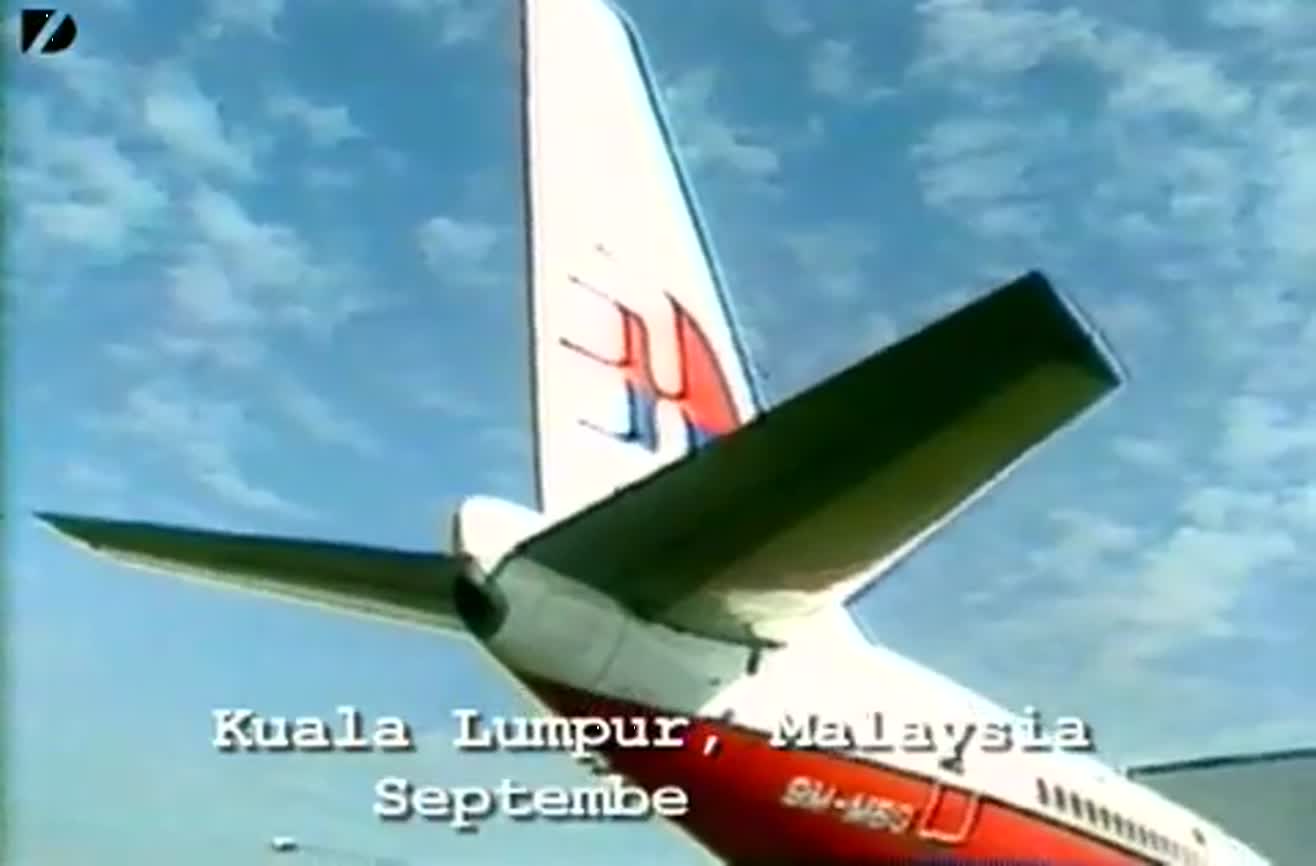 Malaysian man pulls airplane with hair.