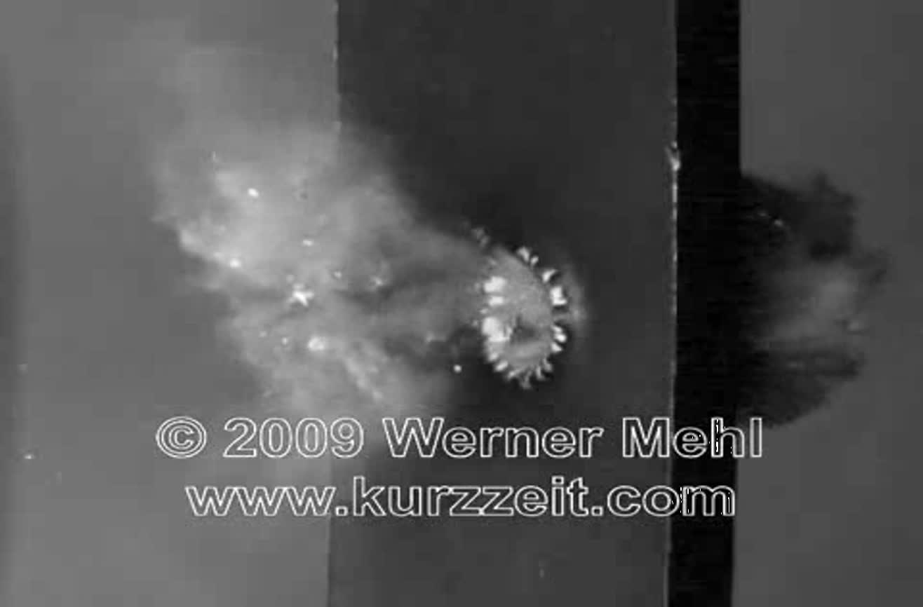 Slow motion bullet impacts.