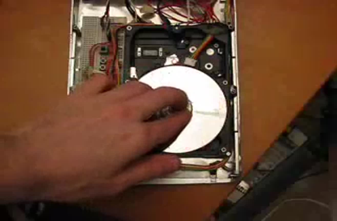 Hard drive turned into LED clock.
