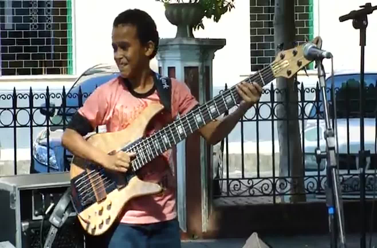 13-year-old plays electric bass like you've never seen before.