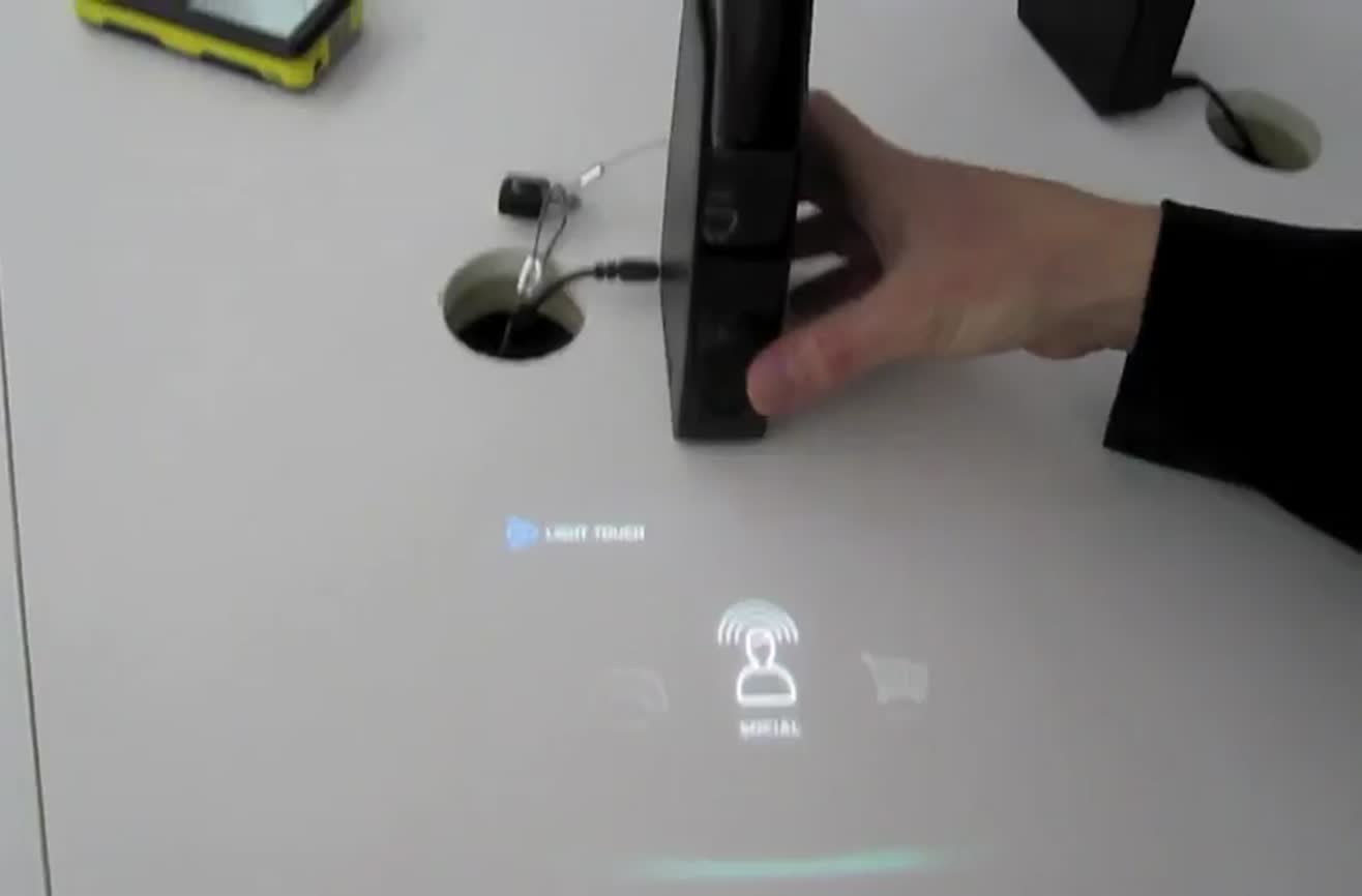 Light Touch: Interactive projector turns any surface into a touch screen.