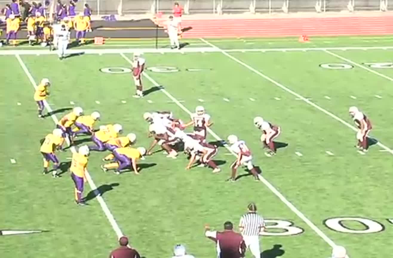 A middle school football team tries a trick play.