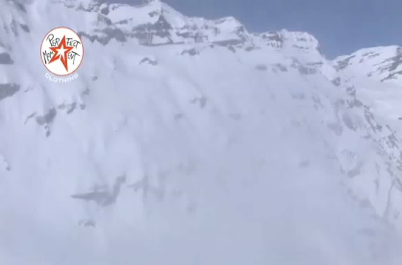 Skier accidently sets cliff drop record.