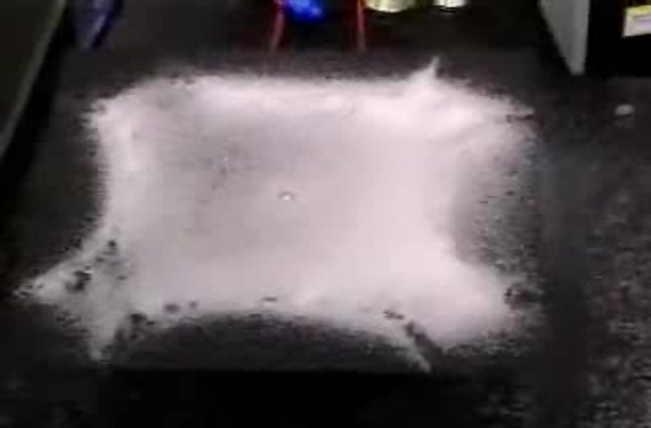 Sand gets hit by sound waves.
