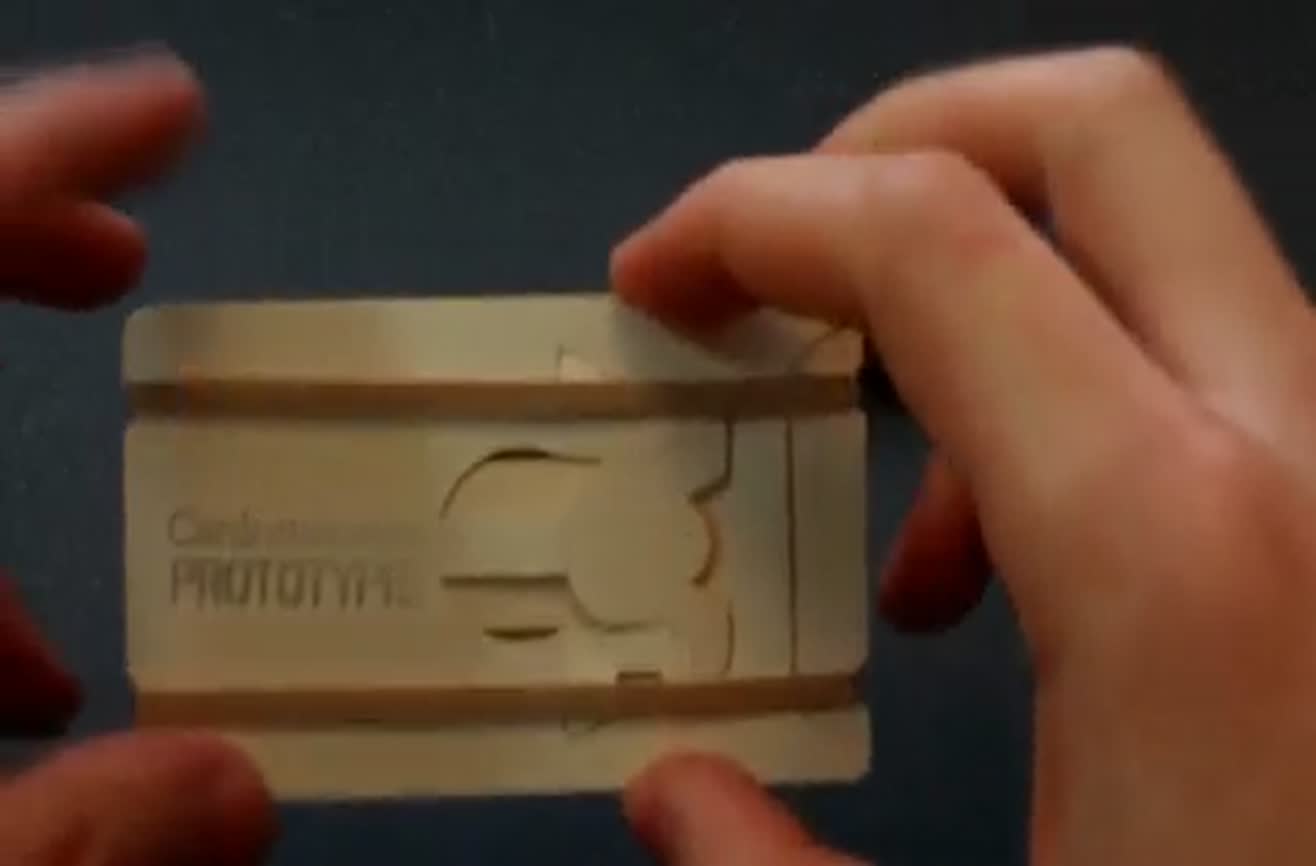 Penny shooter business card.