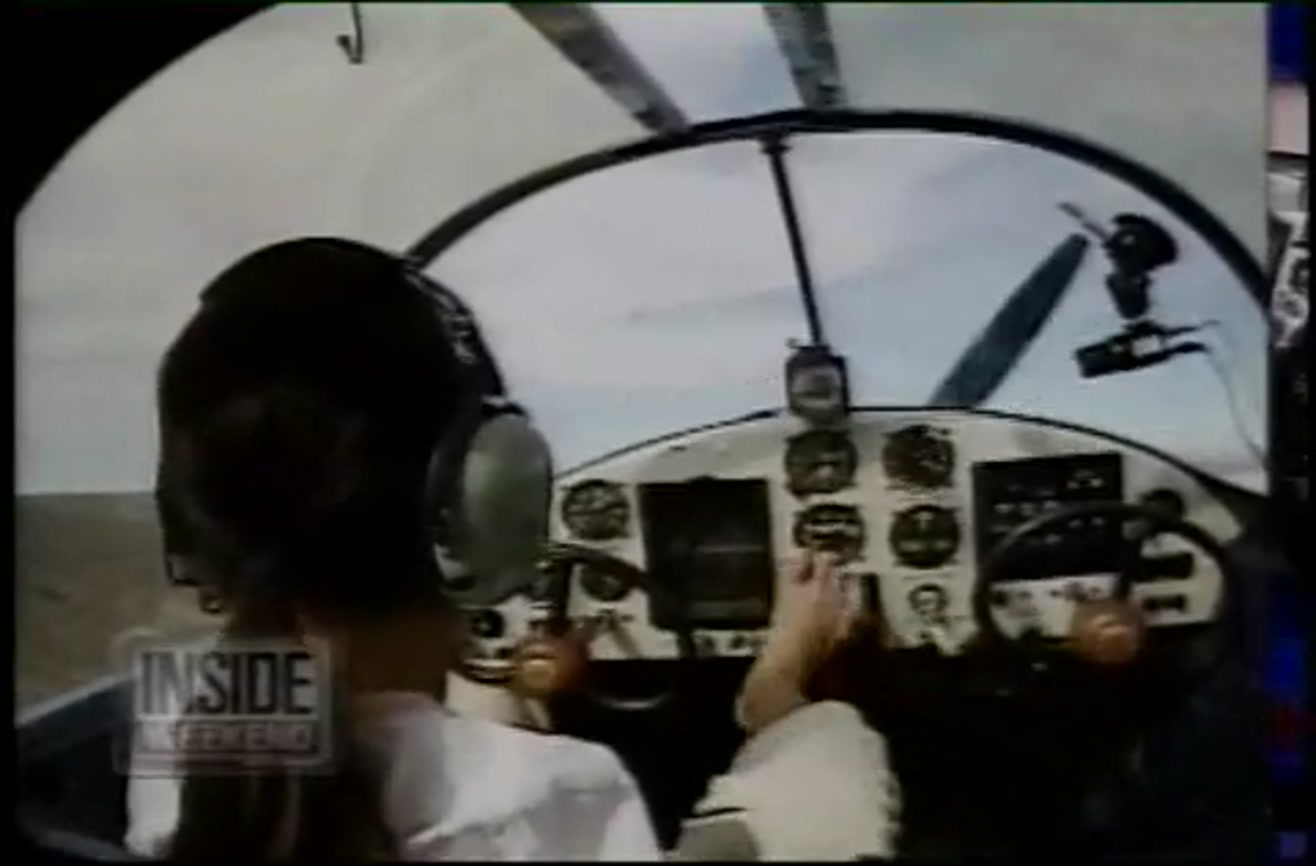 Armless woman pilots a plane.