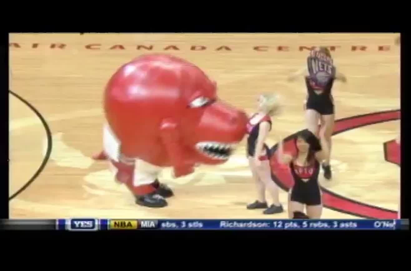 Raptor devours cheerleader.