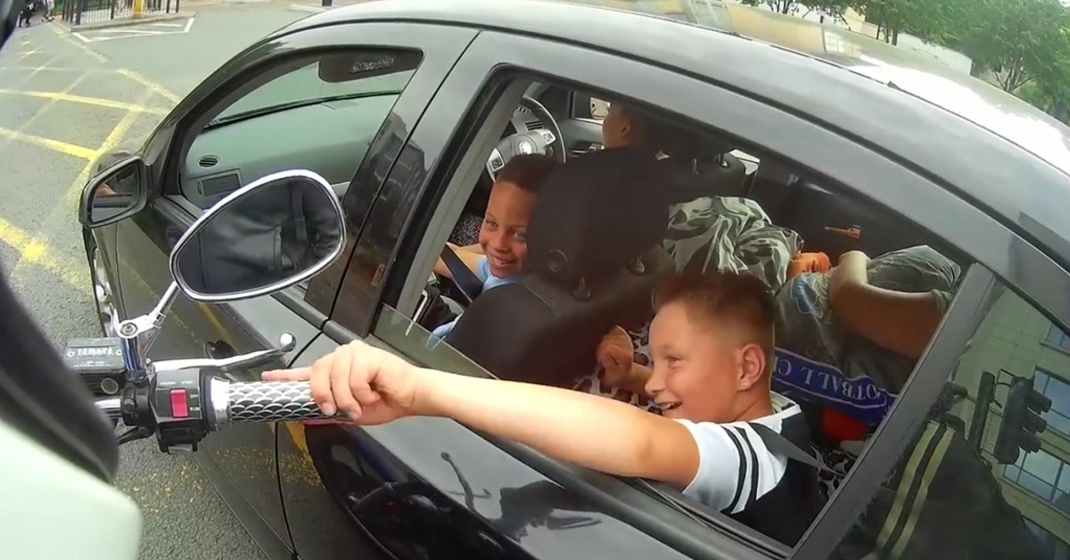 Biker lets kids rev the engine.