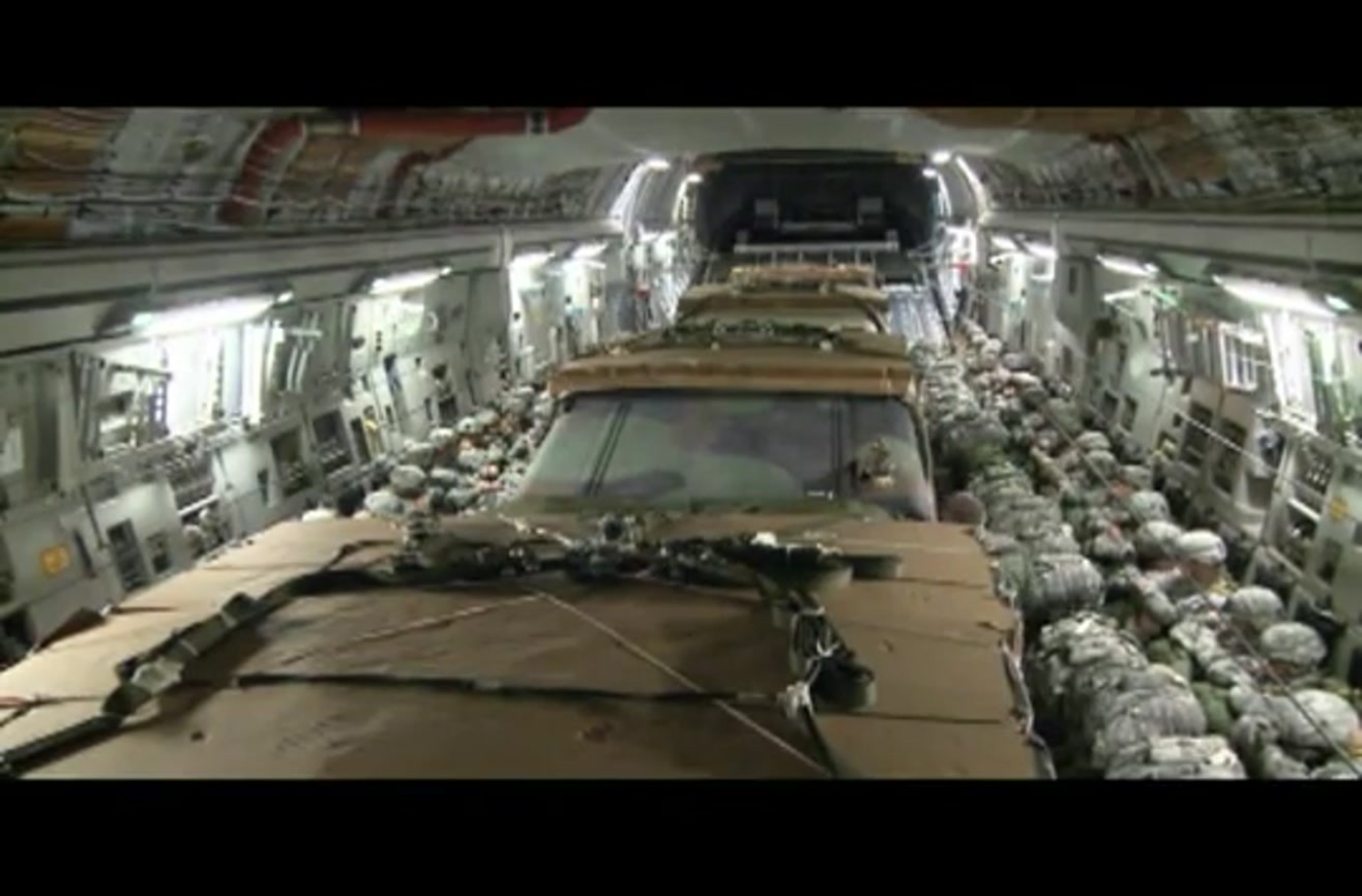 C-17 airdrop: Four humvees and 50 paratroopers.