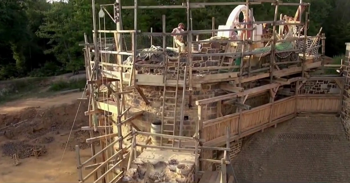 A group of history enthusiasts are building a castle from scratch using ...