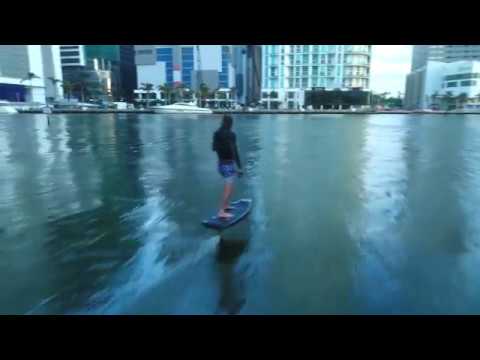 Flying above the water in a battery powered, hydrofoil surfboard