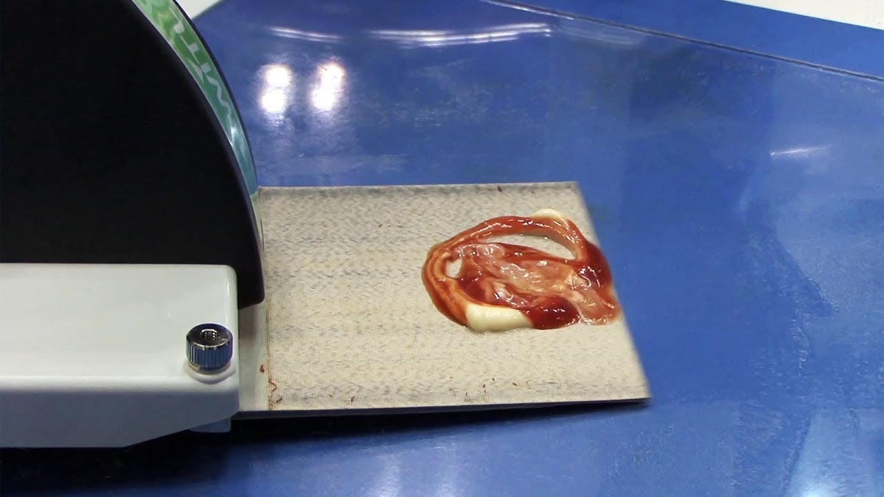 Machine picks up spill and retains shape.