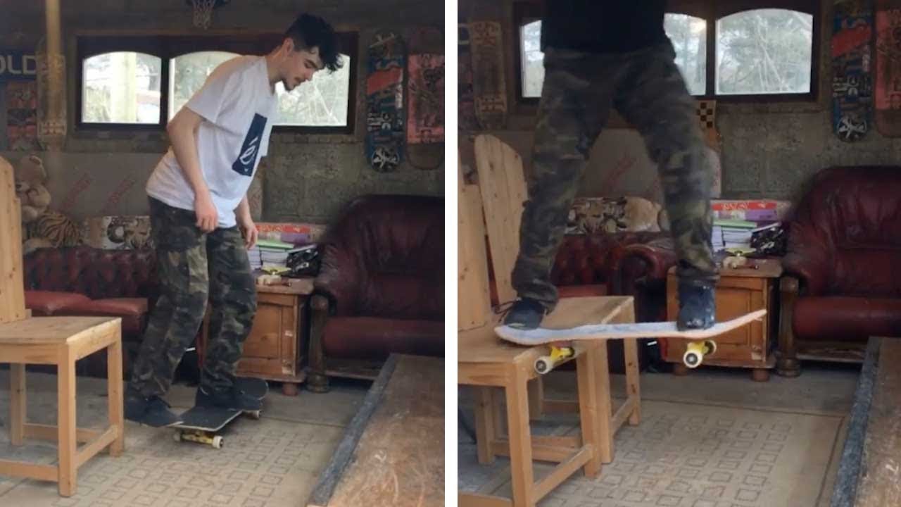Skateboarder practices tricks indoors